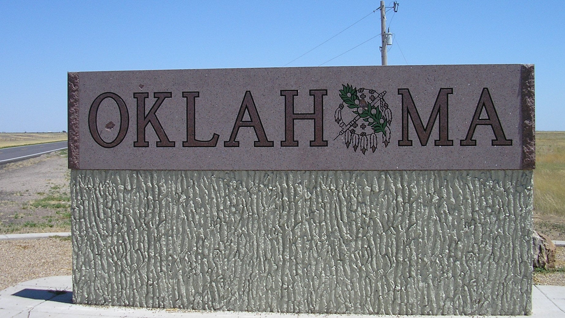 Oklahoma shares a border with how many other states? | QuizGriz
